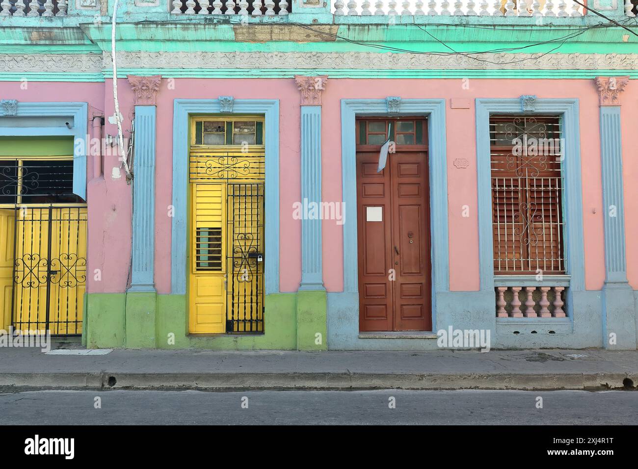 505 One-story Eclectic house of pink facade, light-blue mint-green ...