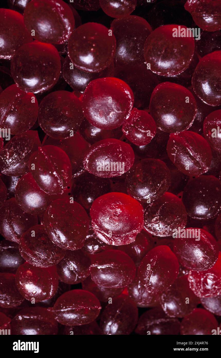 Round acidulated boiled candies Stock Photo - Alamy