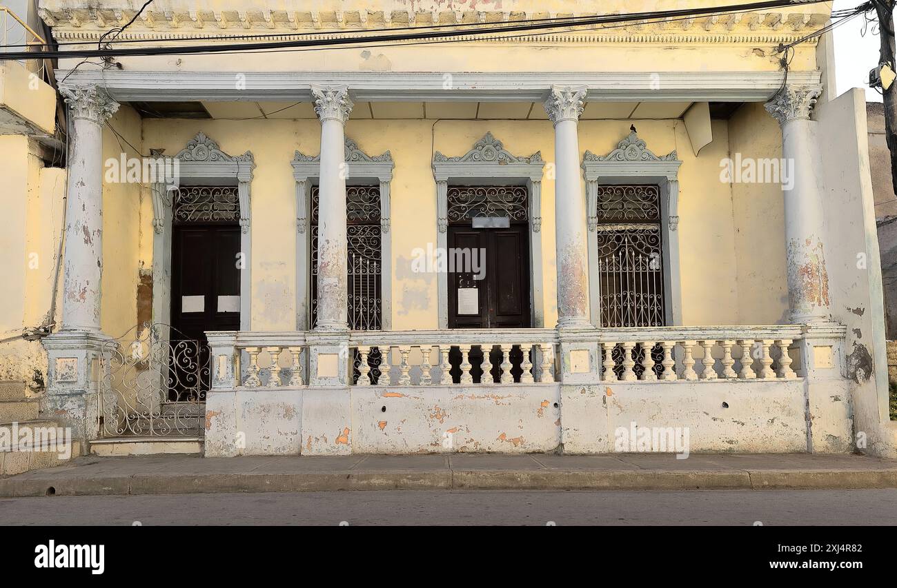 512 One-storey Colonial house facade featuring creamy-yellow wall and ...