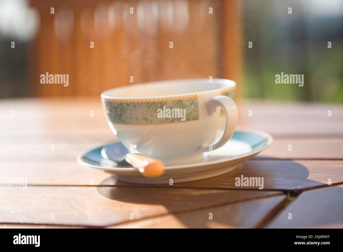 Hot cup of tea on the terrace Stock Photo - Alamy