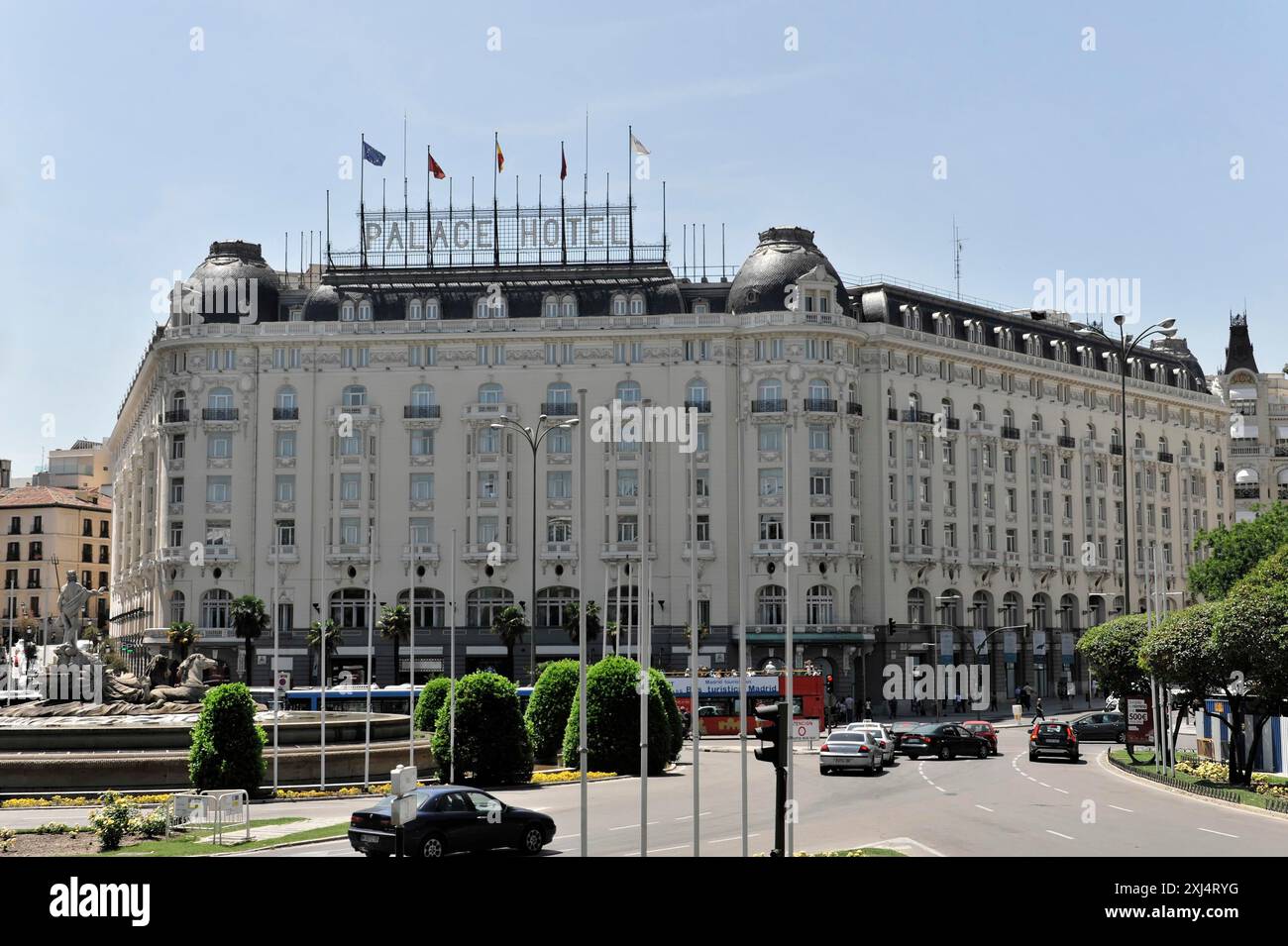 Madrid, Spain, Europe, A large, historic hotel building in a lively ...