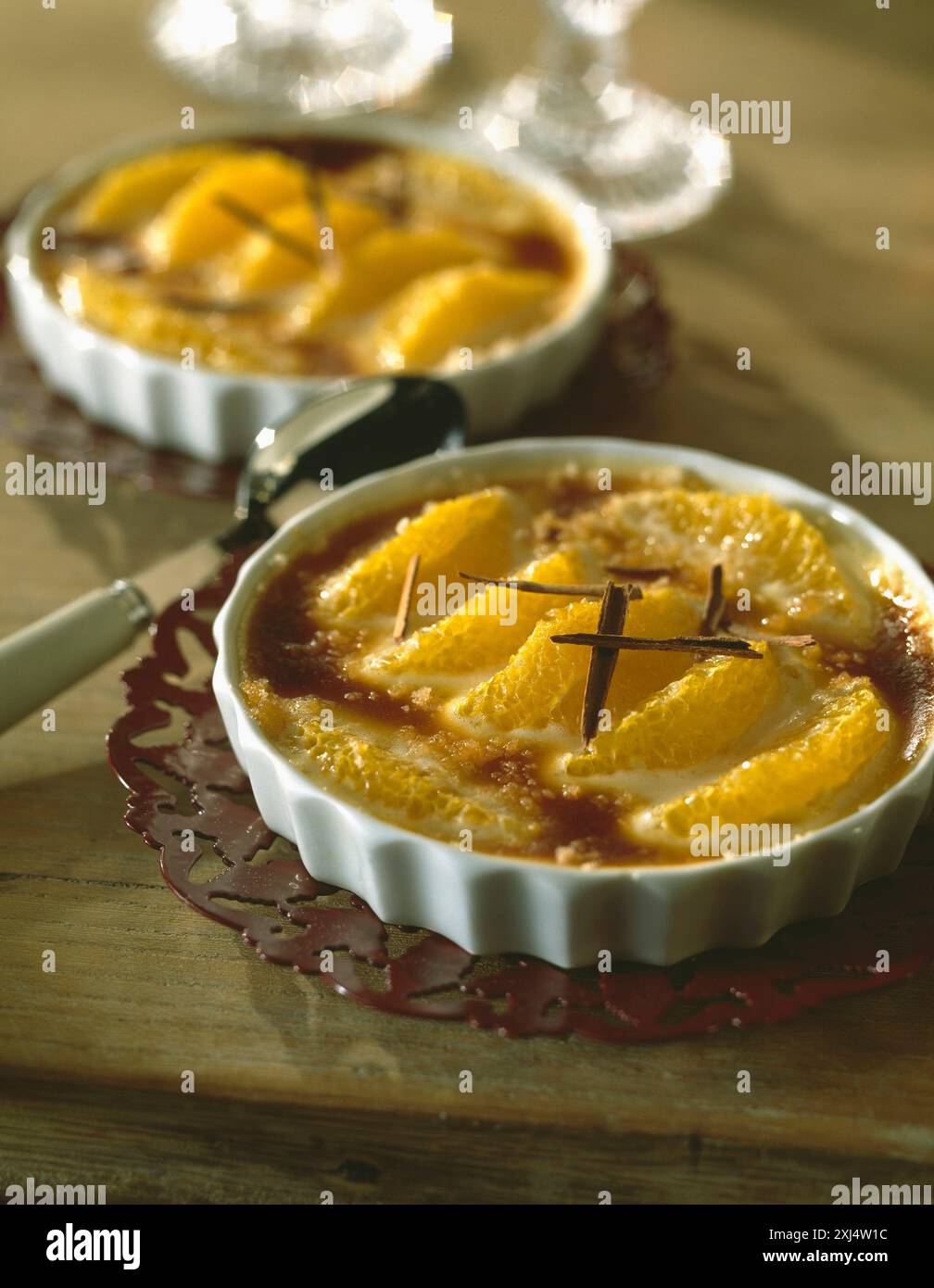 Orange and cinnamon baked egg custard Stock Photo - Alamy