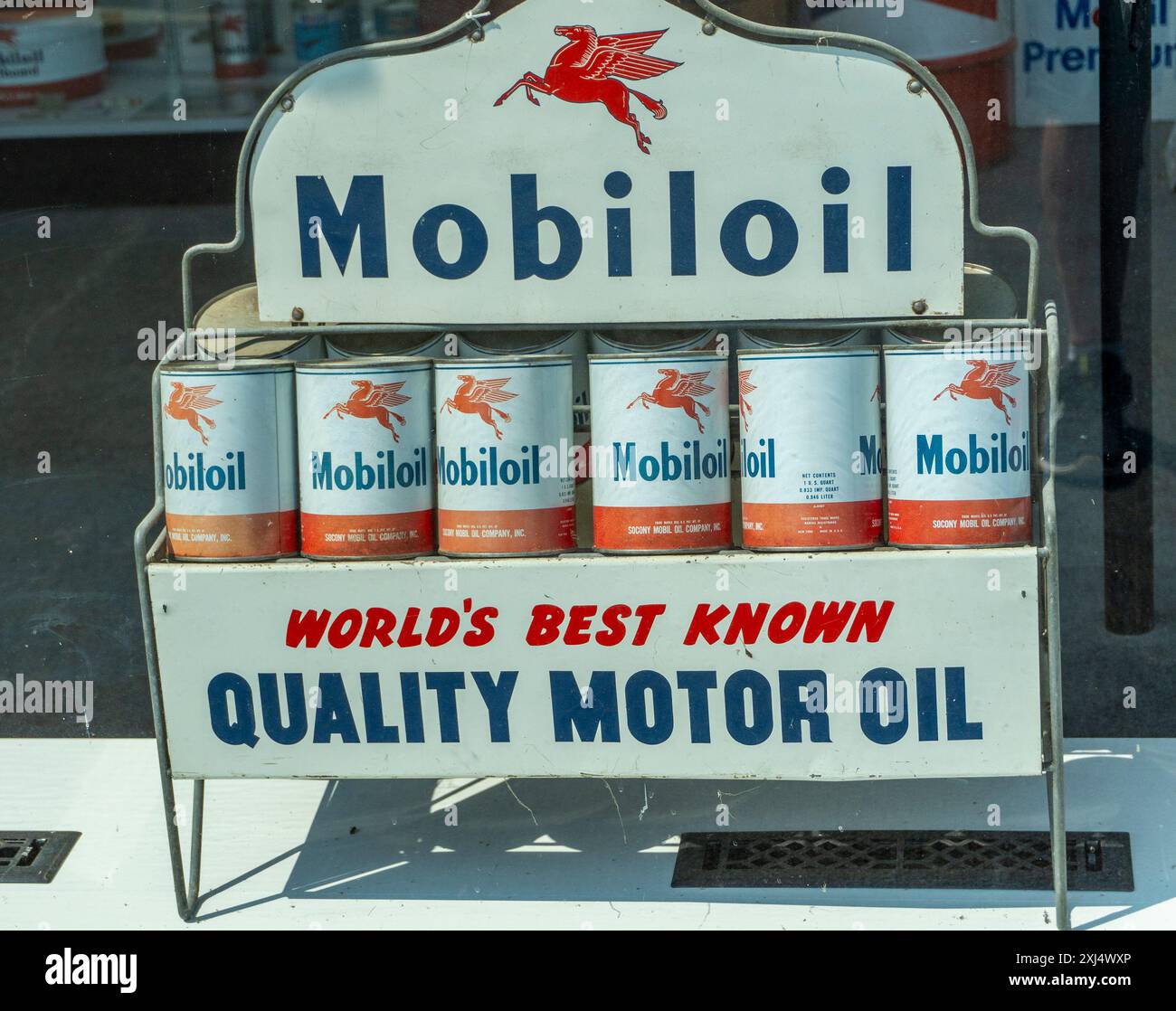 An old oil can display at a gas station in rural New York State Stock ...