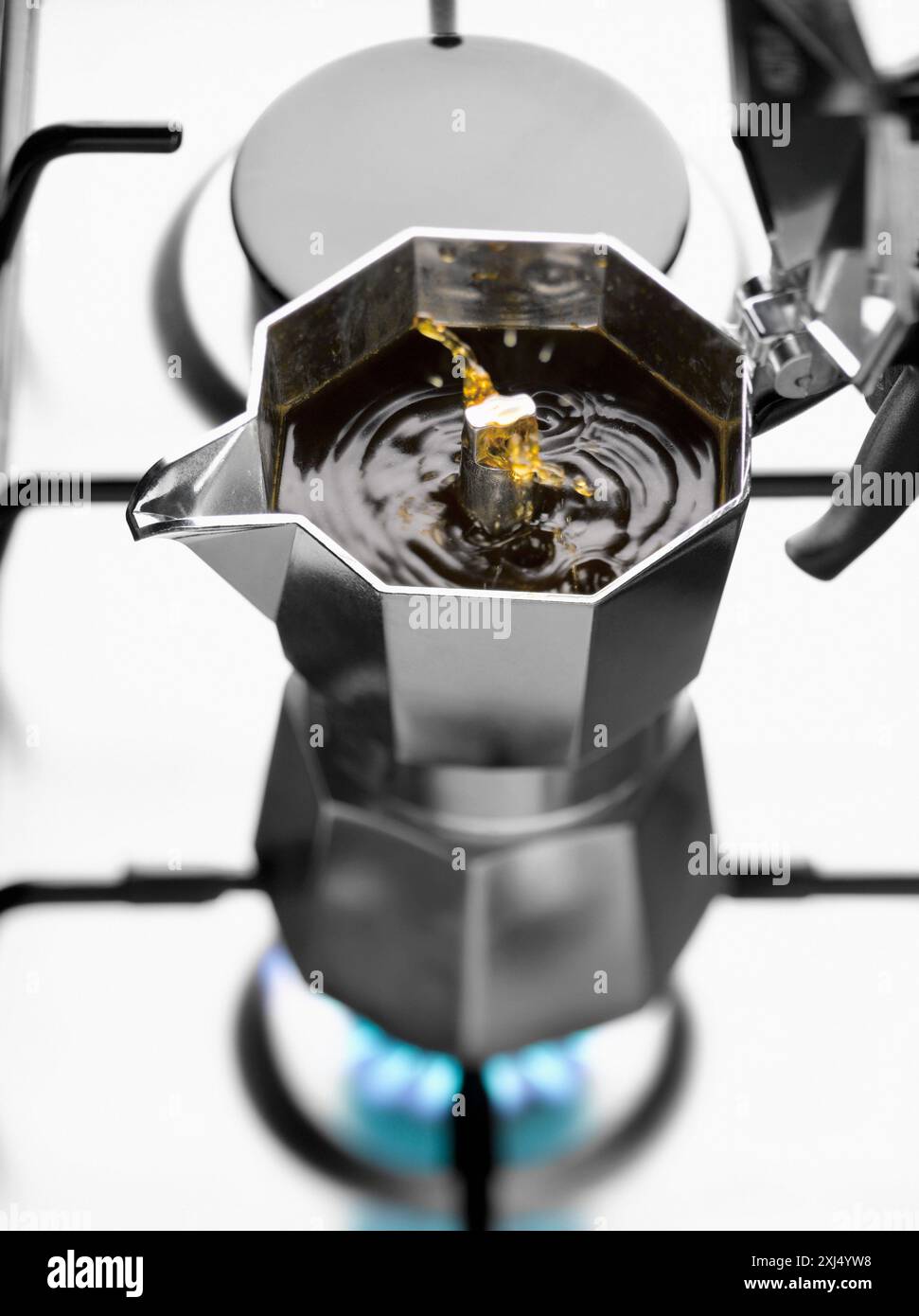 Italian coffee machine on a gas cooker Stock Photo - Alamy