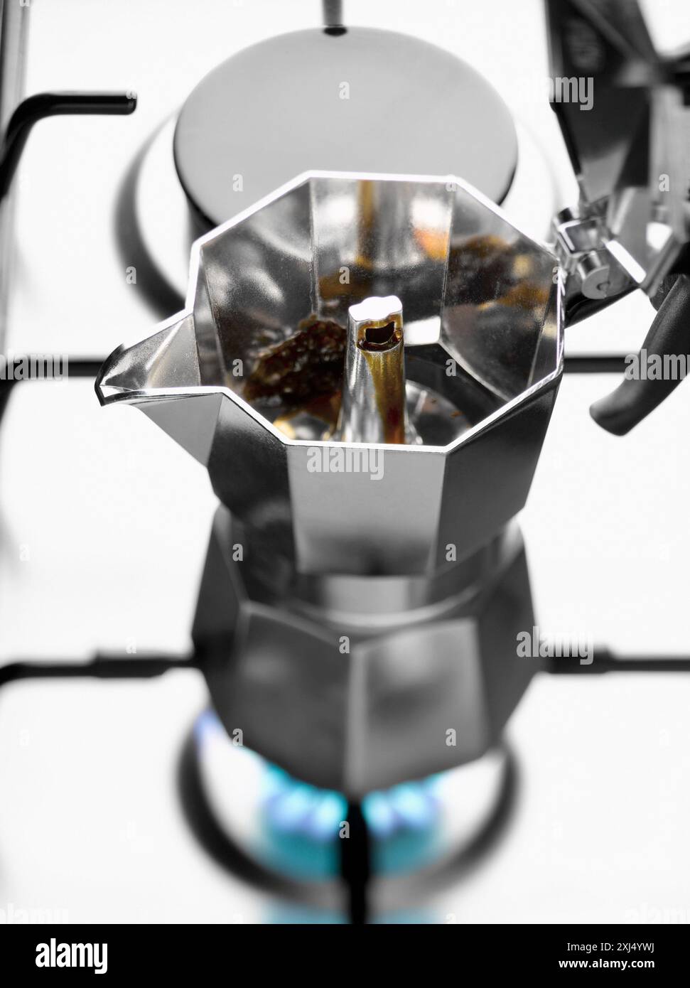 Italian coffee machine on a gas cooker Stock Photo - Alamy