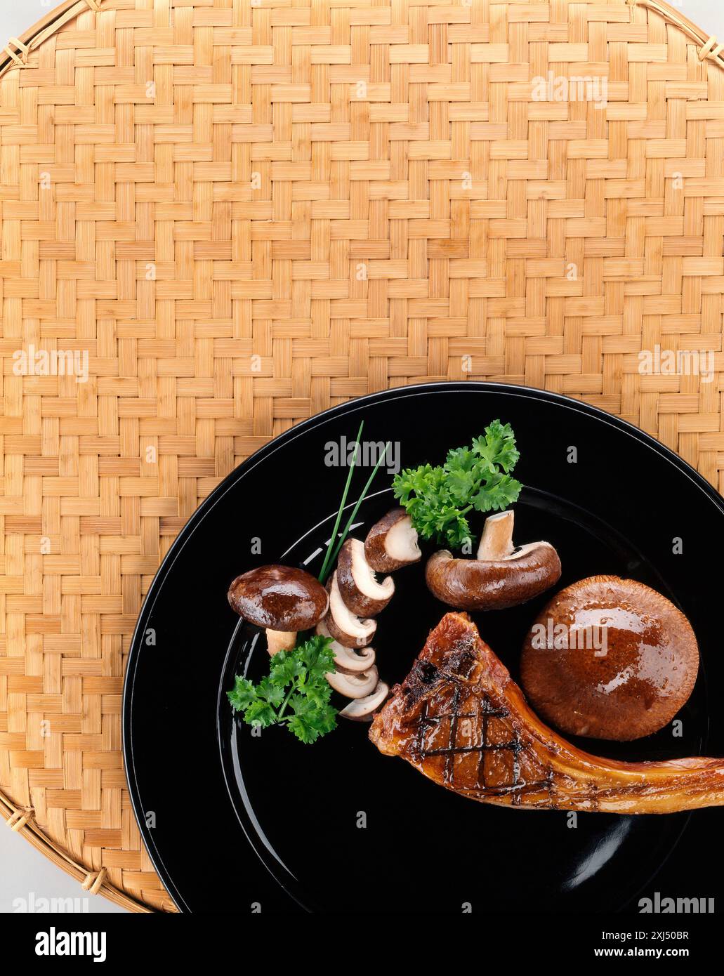 Lamb chop with mushrooms Stock Photo - Alamy