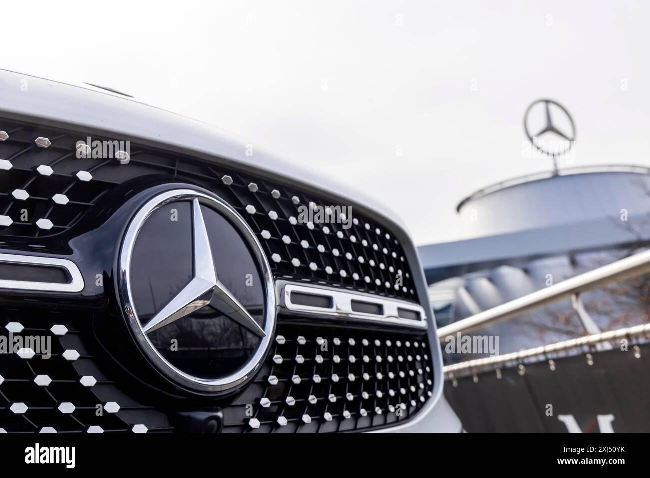 Mercedes, radiator grille and Mercedes star on a modern vehicle, in the ...