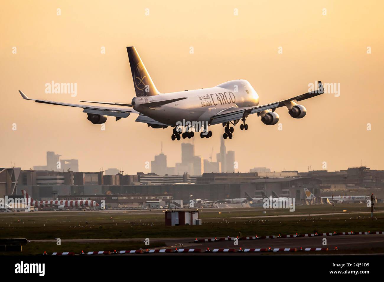 Aircraft shortly in front of landing at Fraport, dawn. Cargo aircraft ...