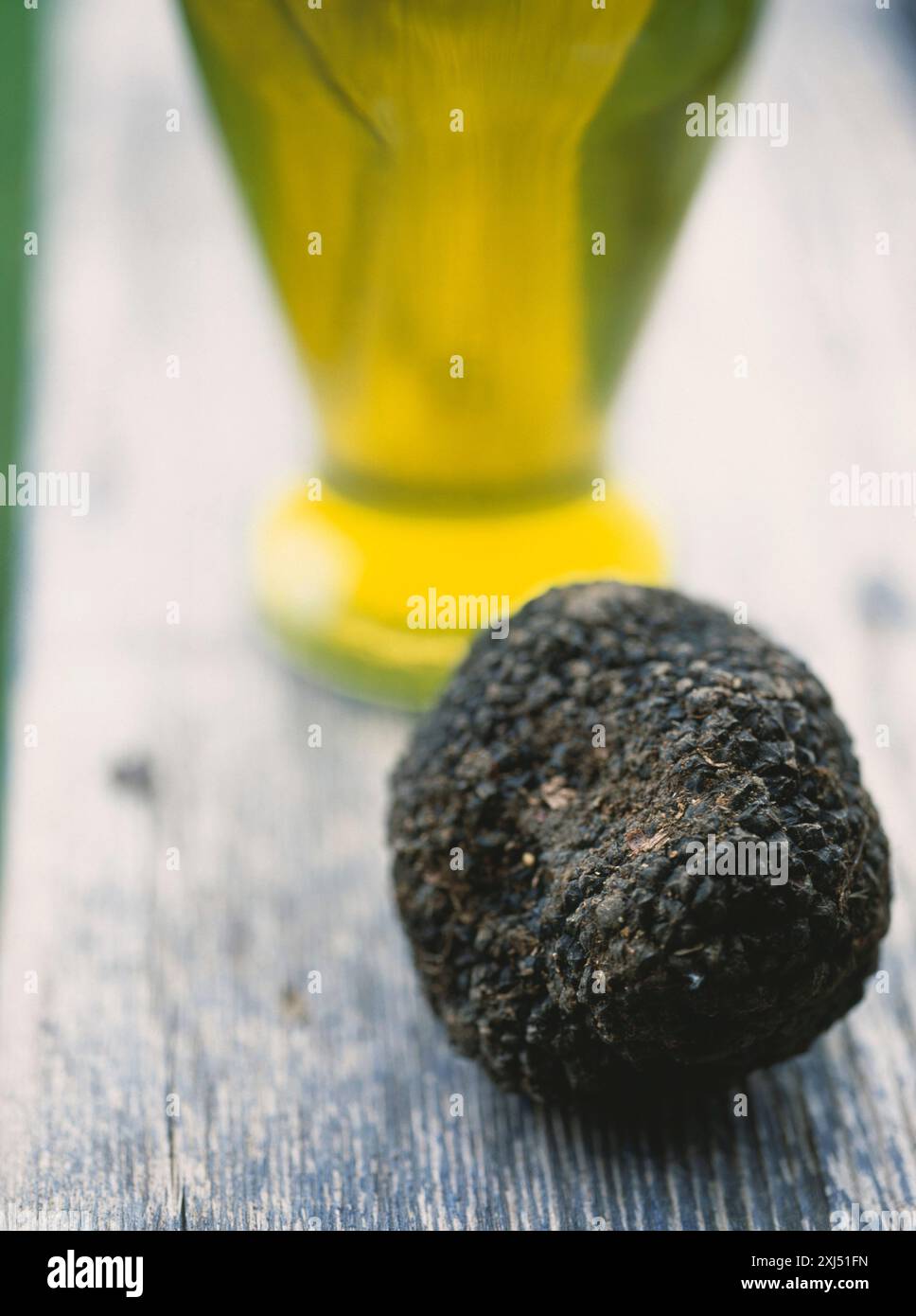 Black truffle and bottle of olive oil Stock Photo - Alamy