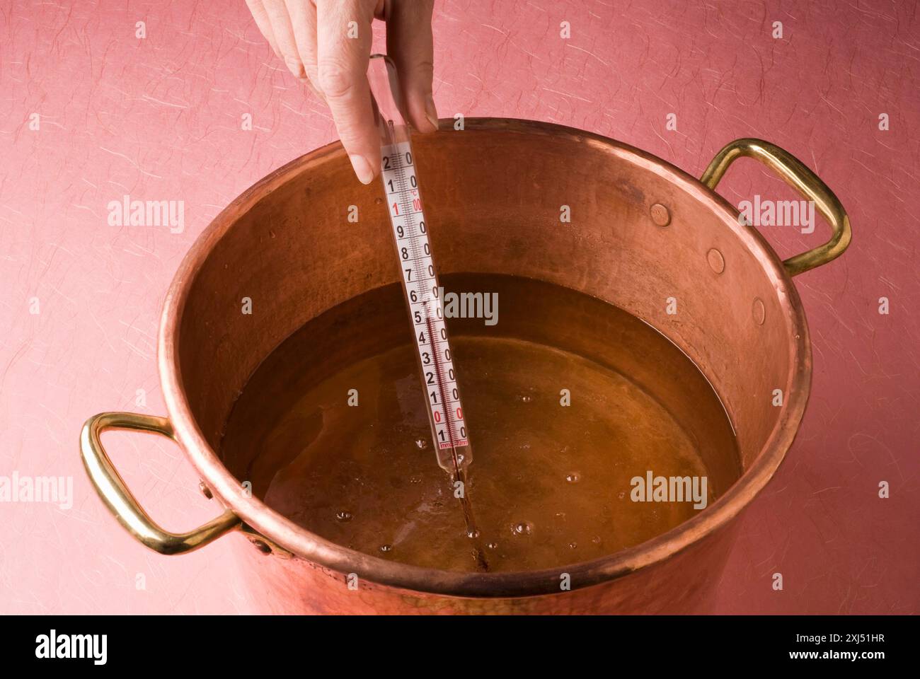Checking the temperature of the syrup Stock Photo - Alamy