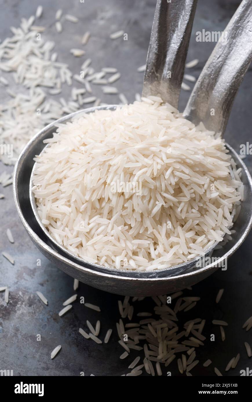 Ladle of Basmati rice Stock Photo - Alamy