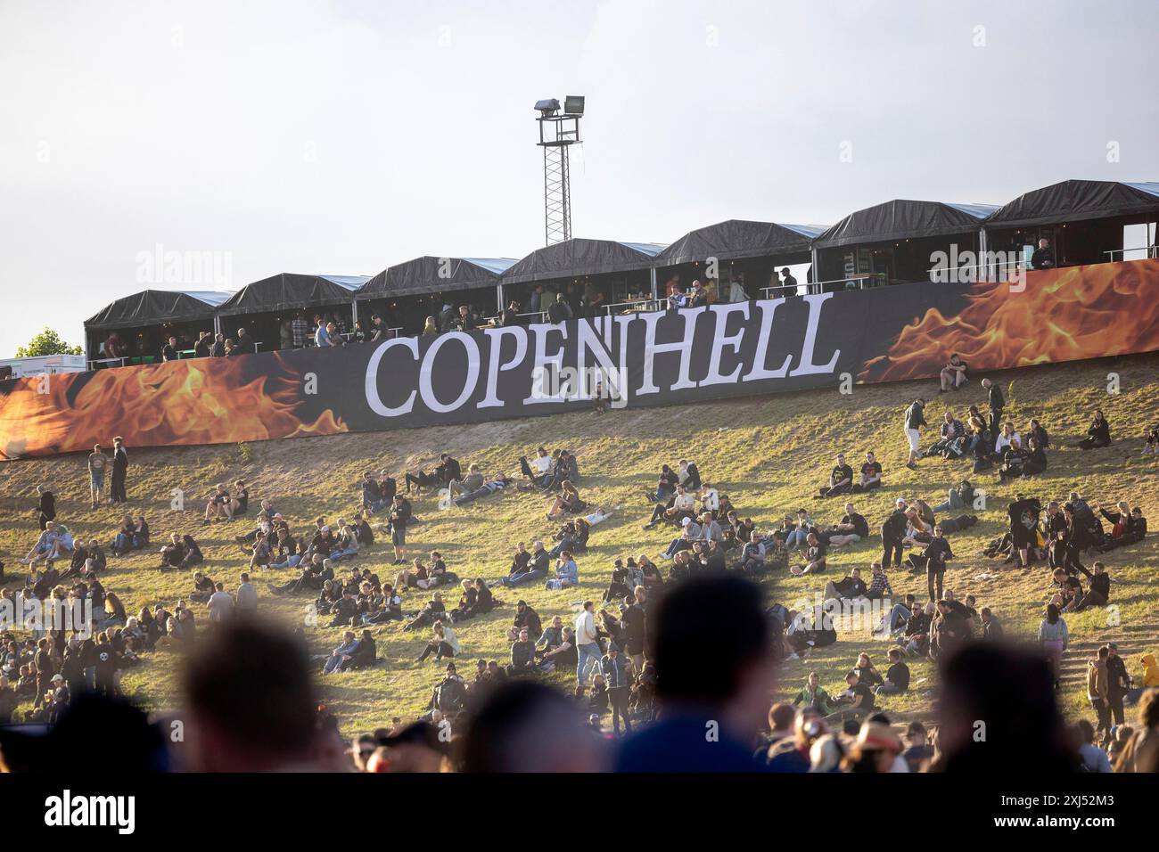 Copenhagen, Denmark - 19 June 2024: Festivalgoers in front of the logo ...