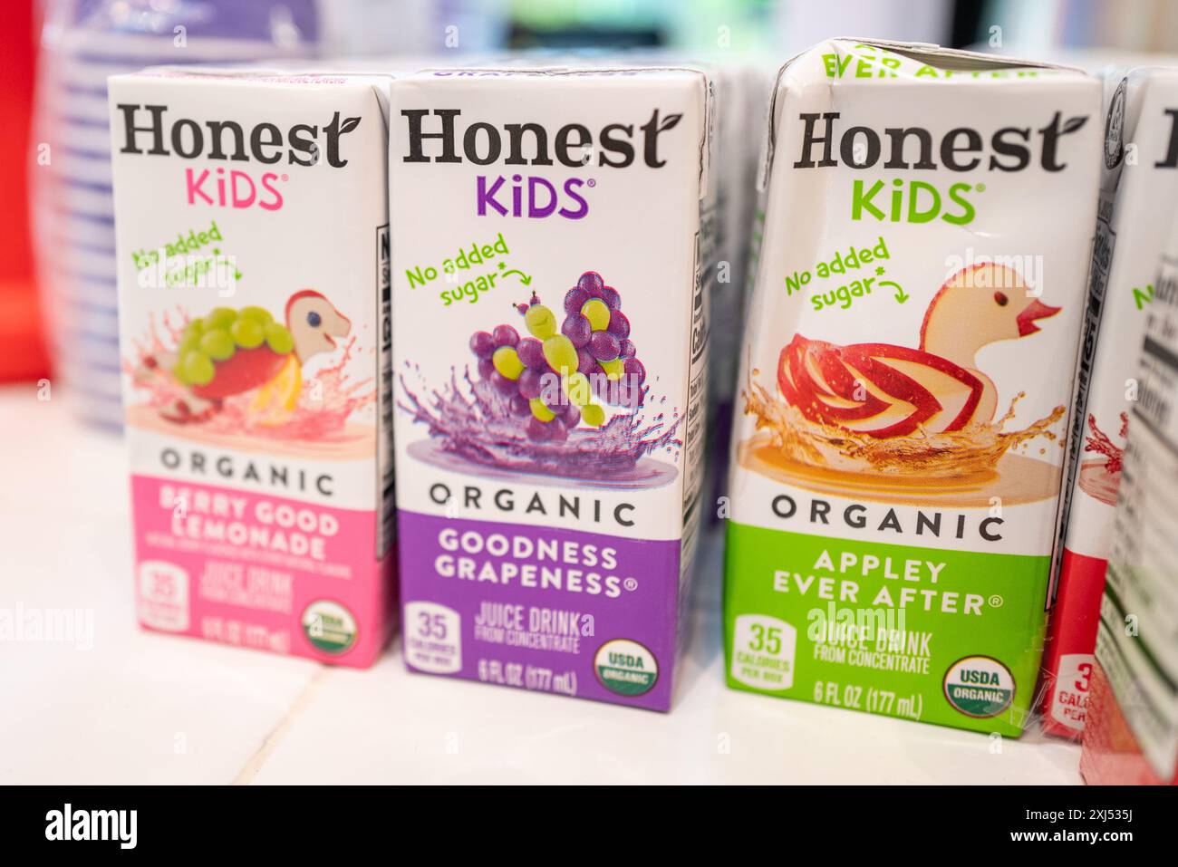 USA. 30th Mar, 2024. Close-up of various Honest Kids brand juice boxes ...