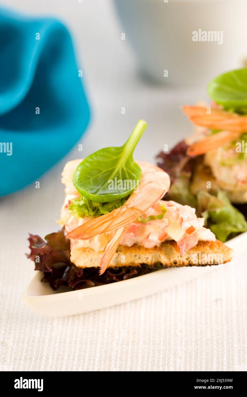 York ham,shrimp,tomato and hard-boiled egg canapé Stock Photo - Alamy