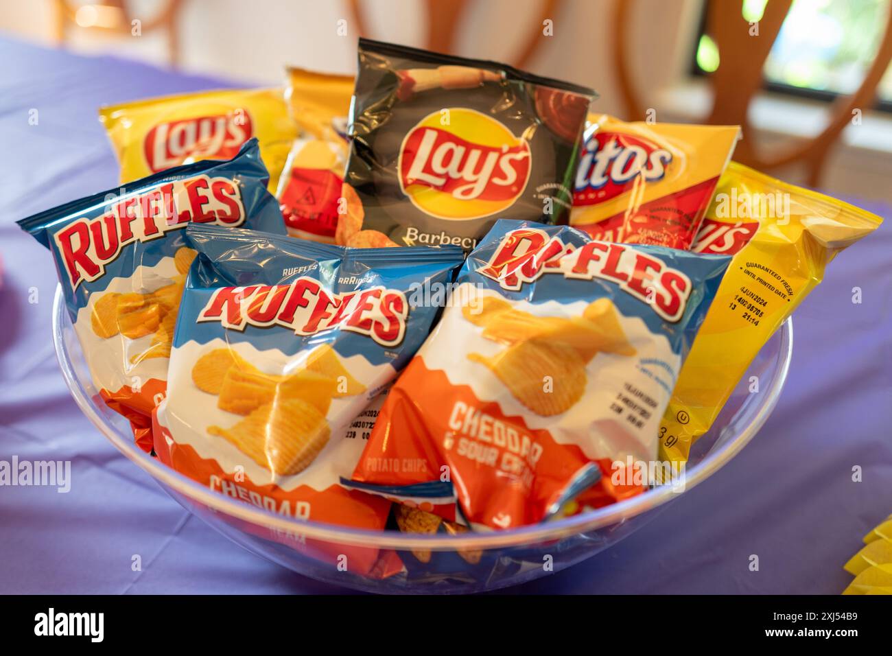 USA. 30th Mar, 2024. Bucket with individual bags of Ruffles and Lays ...