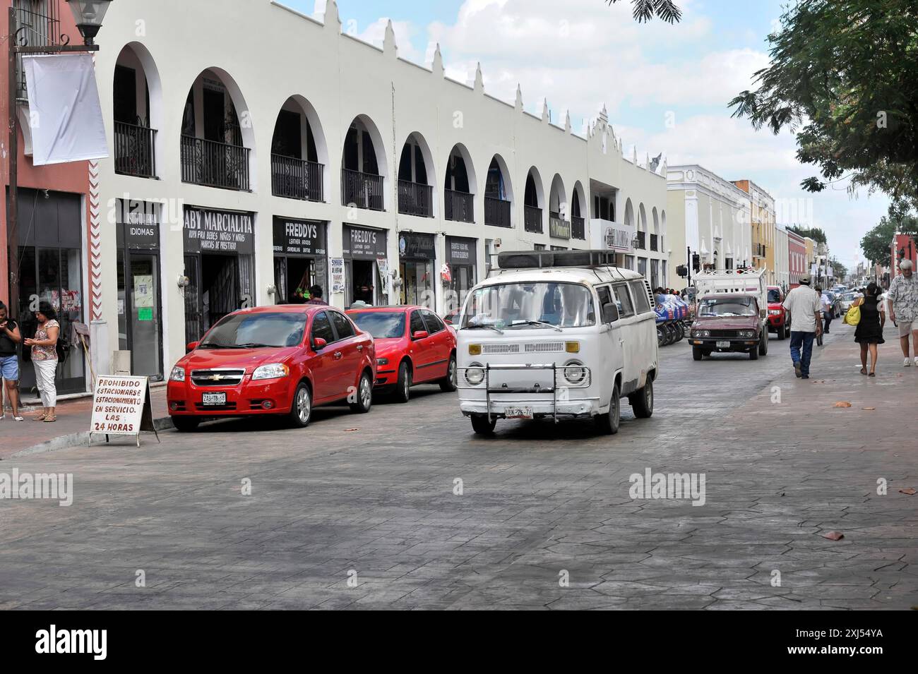 Merida, Yucatan, Mexico, Central America, Street scene with parked cars ...
