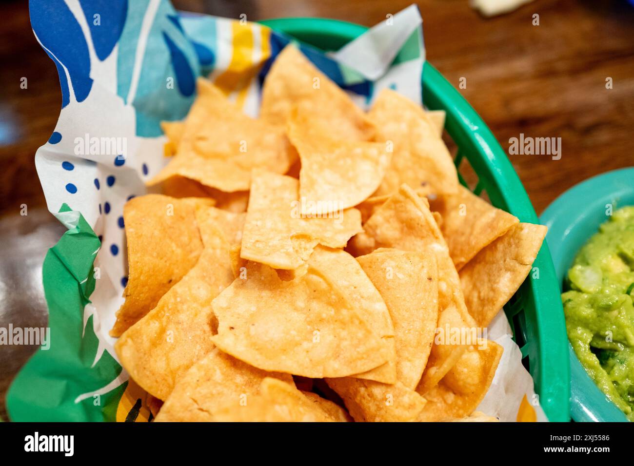 USA. 04th June, 2024. Container of house-made tortilla chips at Cholita ...