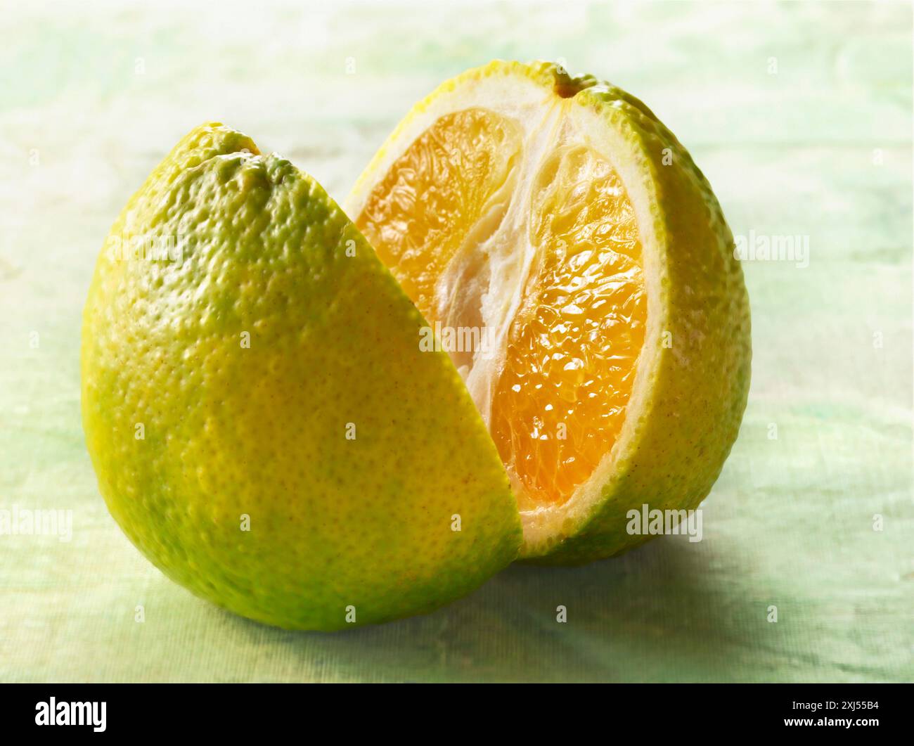 Cut in half pomelo hi-res stock photography and images - Alamy