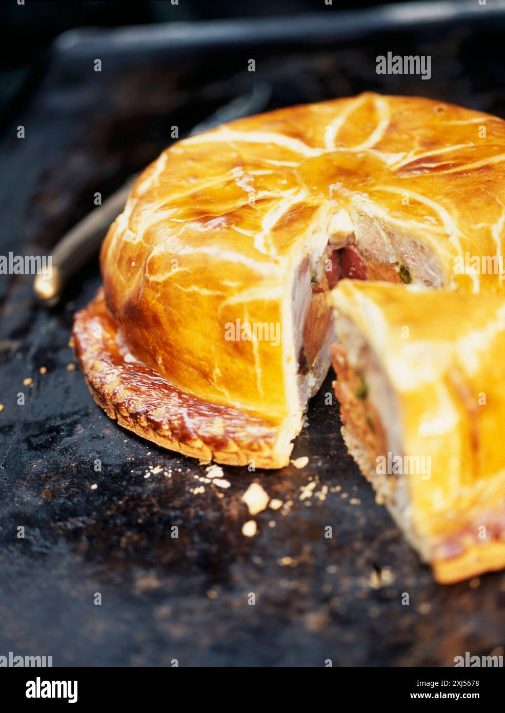 Game and foie gras pie Stock Photo - Alamy