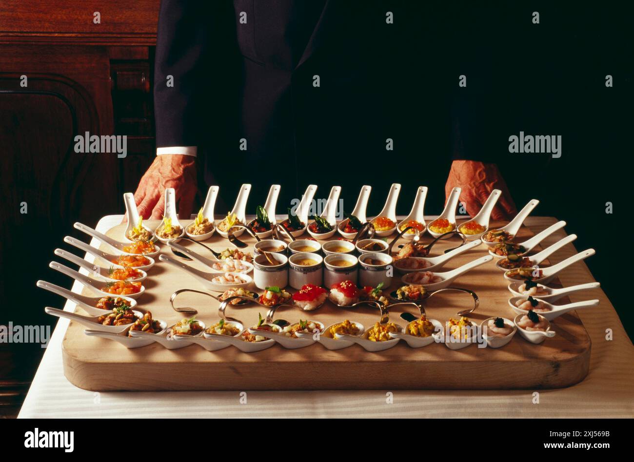 Buffet with spoons Stock Photo - Alamy