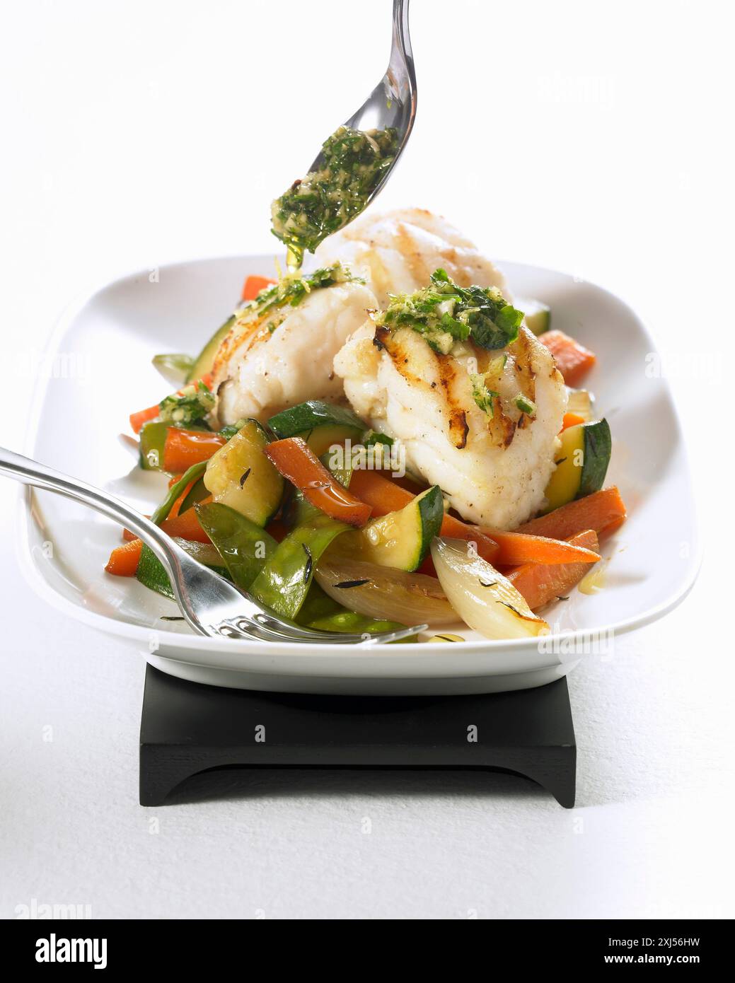 Grilled monkfish with pan-fried vegetables Stock Photo - Alamy