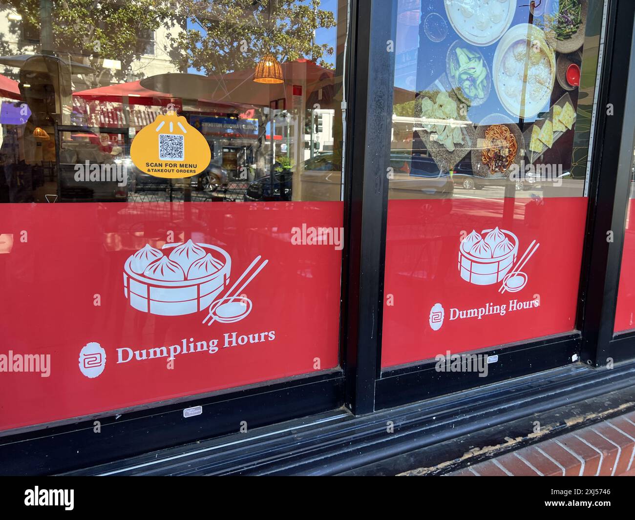 USA. 11th Apr, 2024. Exterior view of Dumpling Hours window with ...