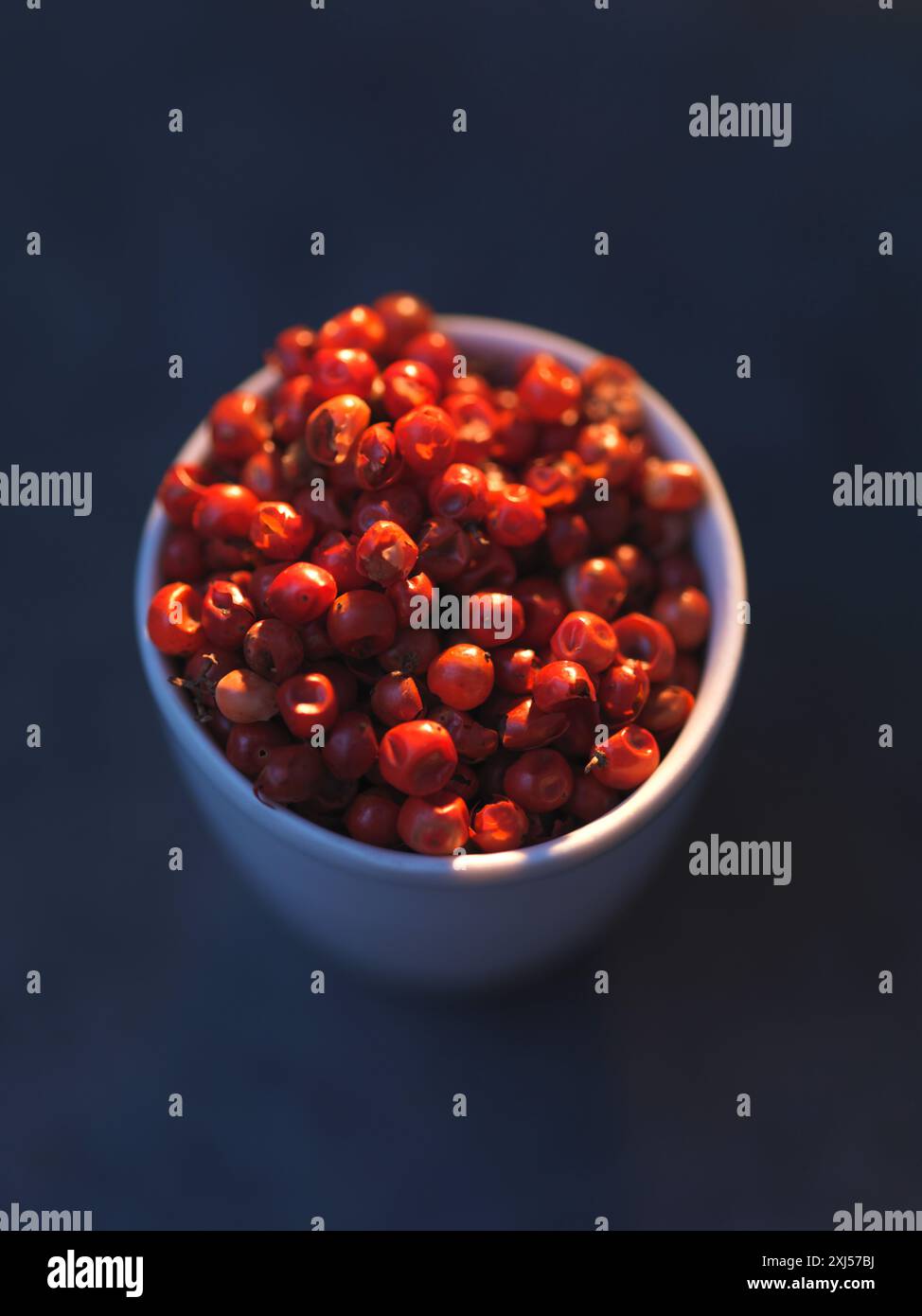 Pink pepper corns Stock Photo - Alamy