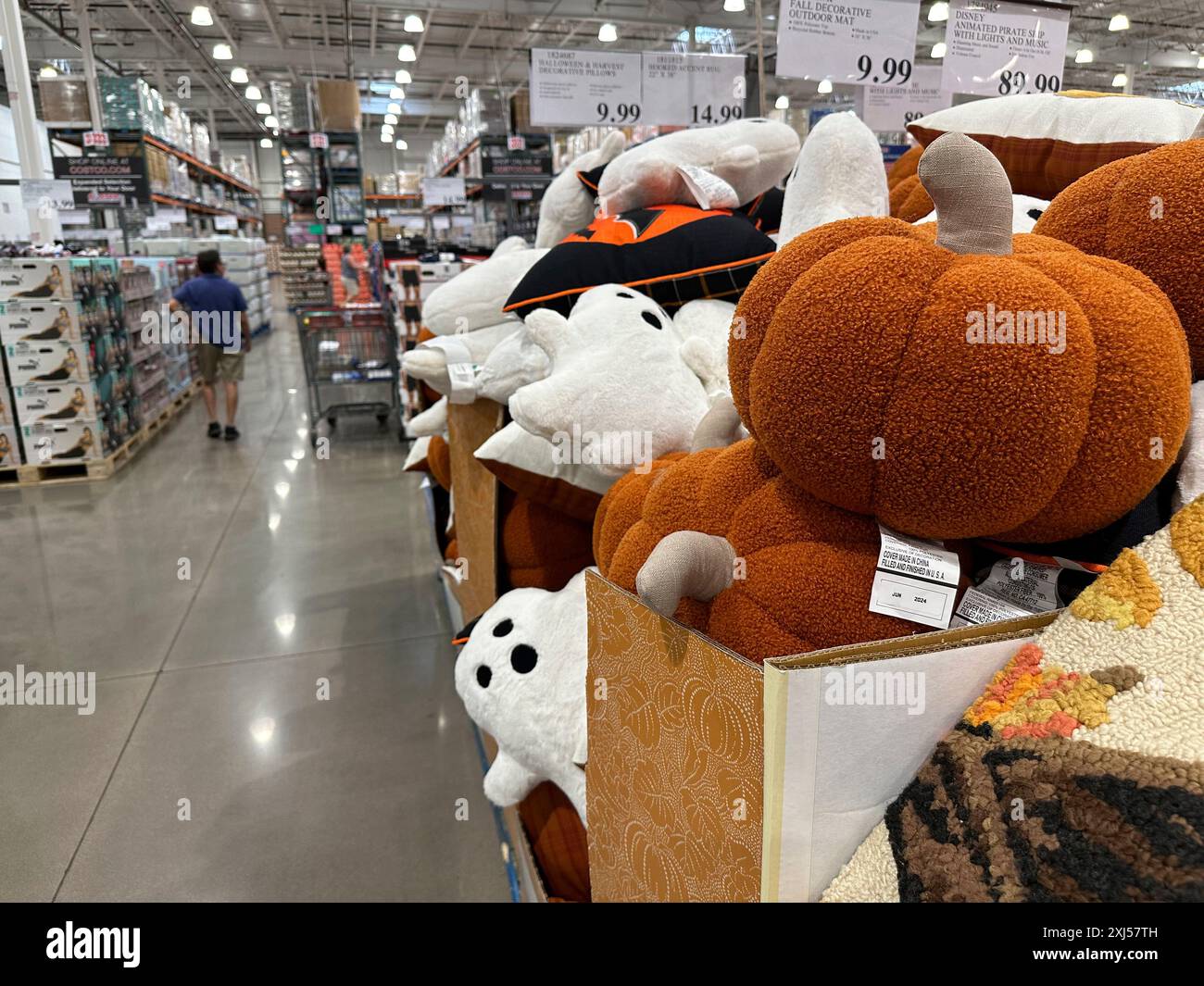 Decorative items for autumn sit on display in a Costco warehouse ...
