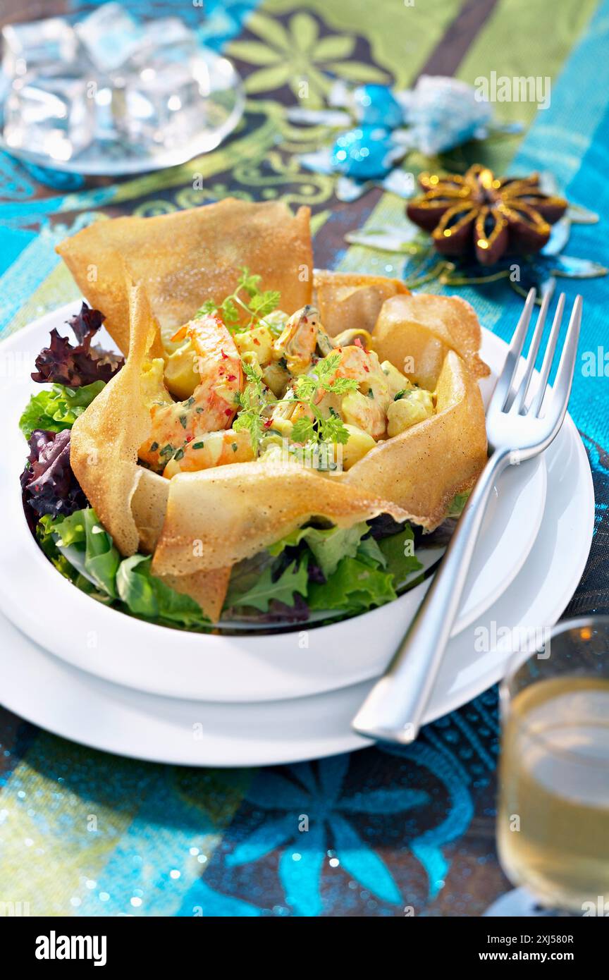 Seafood curried fricassée in a crisp shell Stock Photo - Alamy