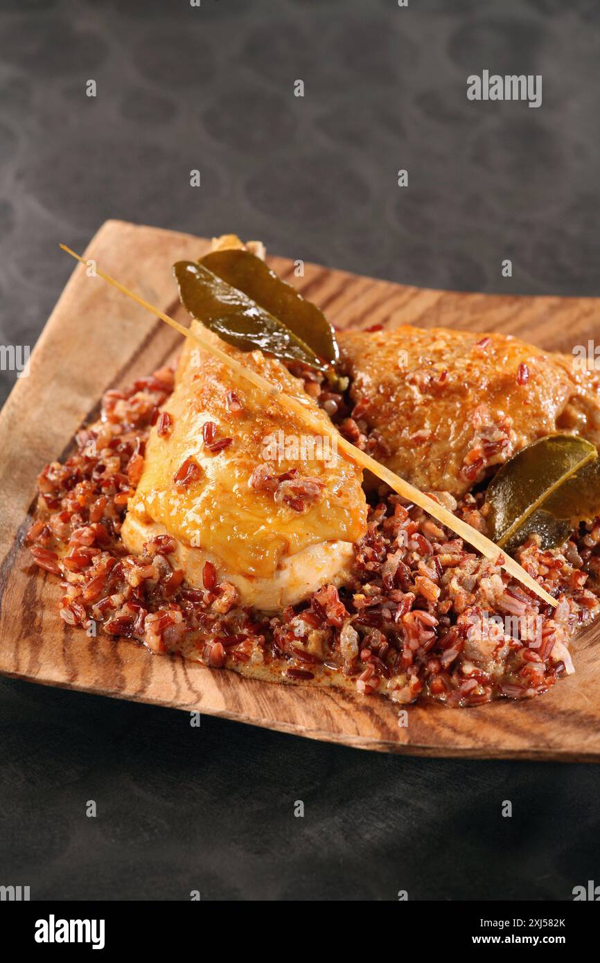 Chicken and red rice saté Stock Photo - Alamy