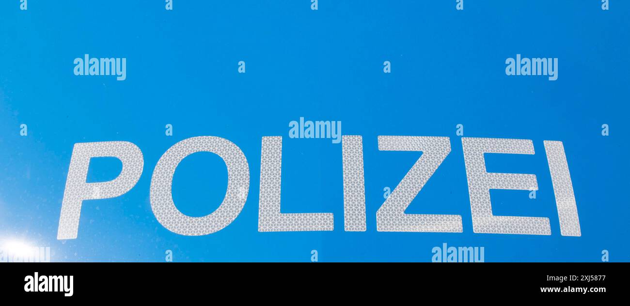 Police logo on a new police patrol car at the police station in Potsdam ...