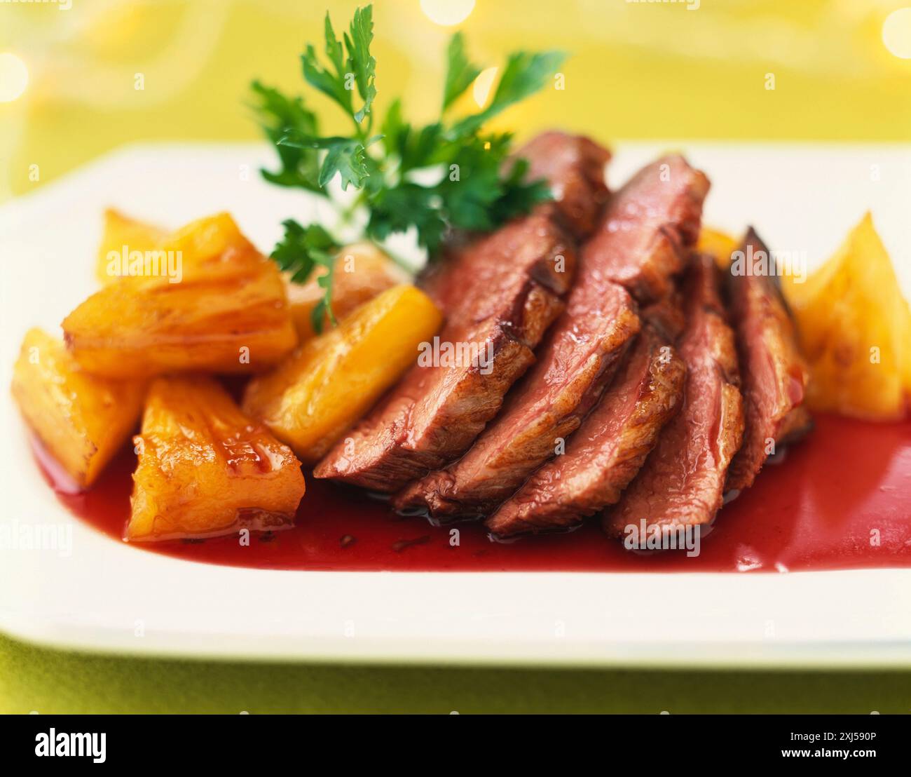 Glazed duck magret with pineapple Stock Photo - Alamy