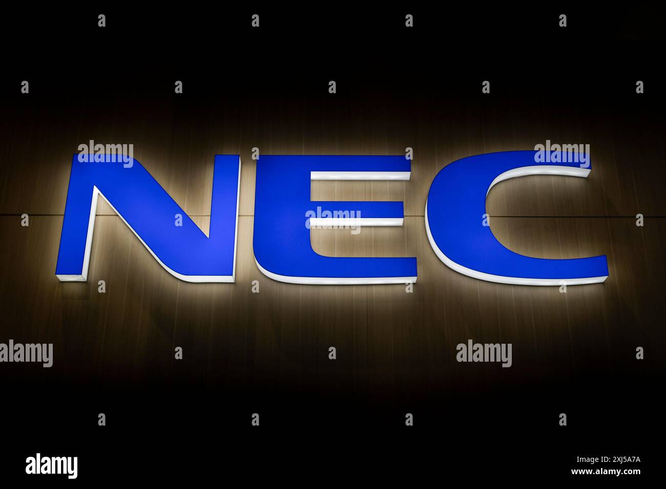 NEC, Logo at the exhibition stand, MWC Mobile World Congress 2024, Barcelona, Spain Stock Photo ...