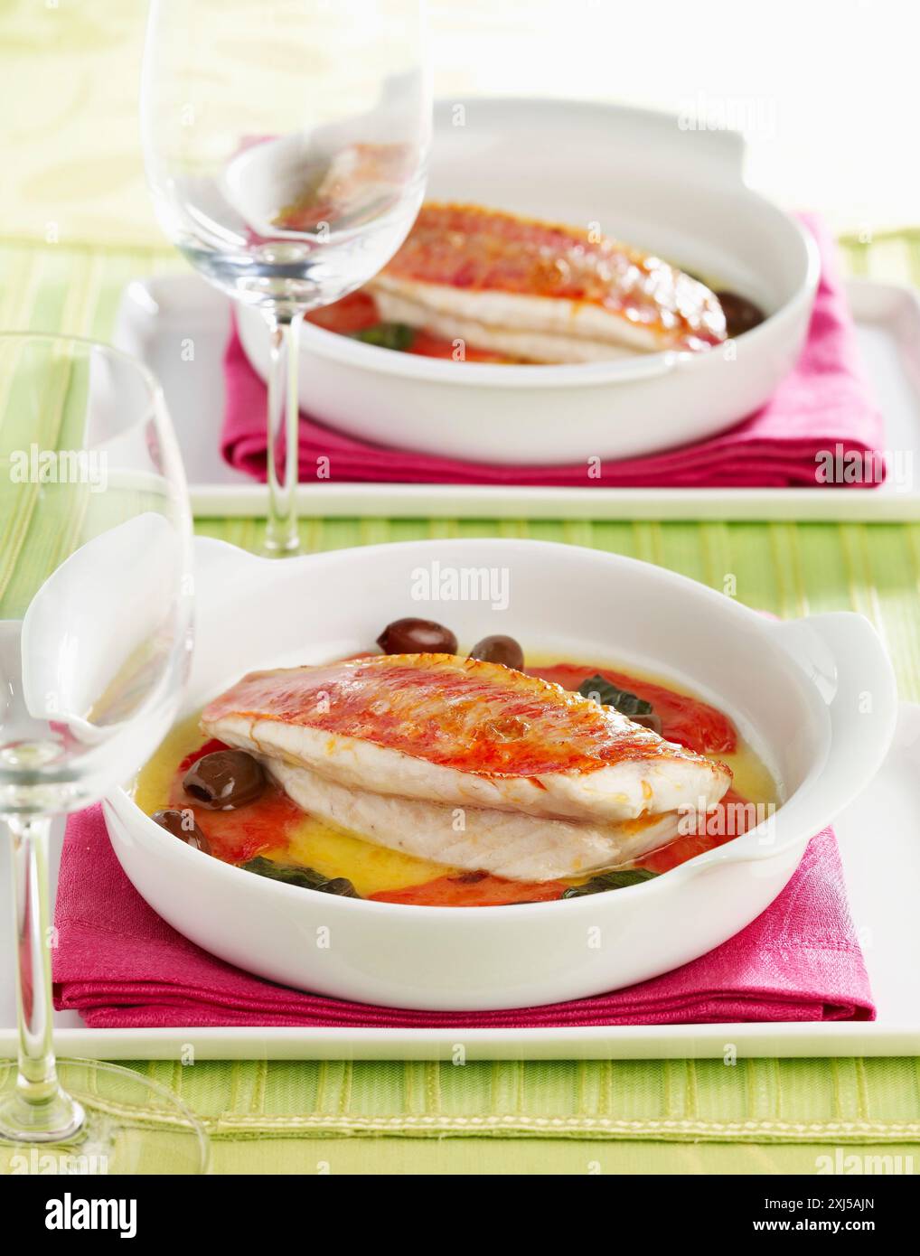 Oven-baked red mullet fillets Stock Photo - Alamy