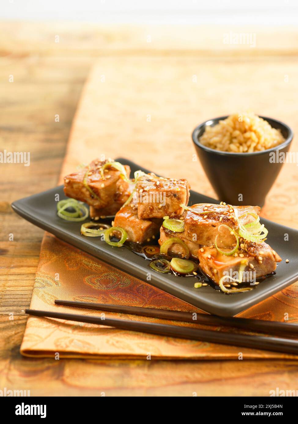 Fresh tuna cubes with soya sauce and ginger Stock Photo - Alamy