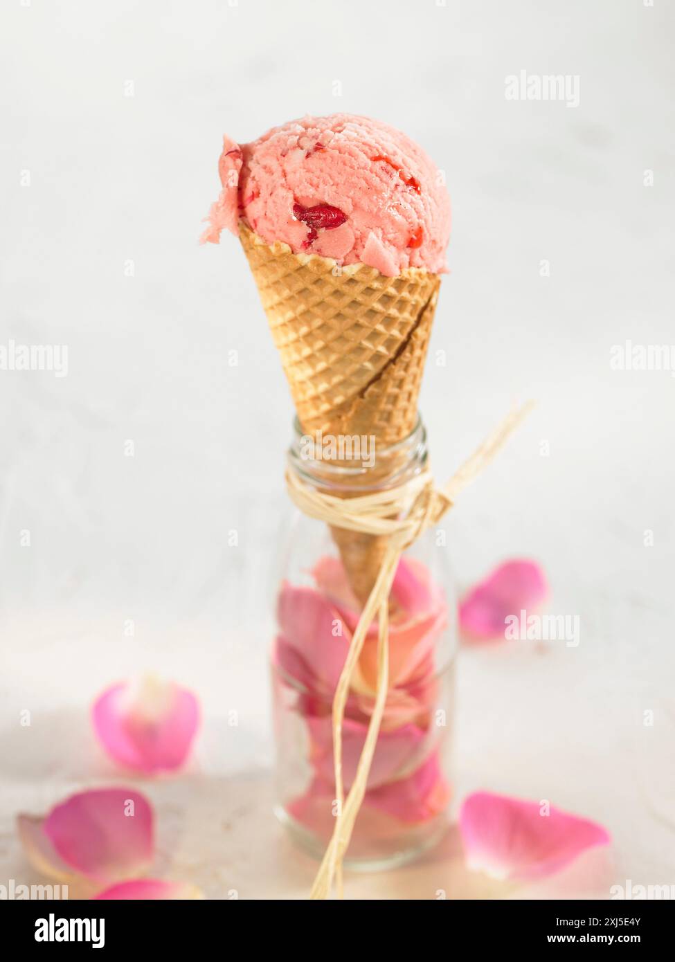 Rose-flavored ice cream cone Stock Photo - Alamy