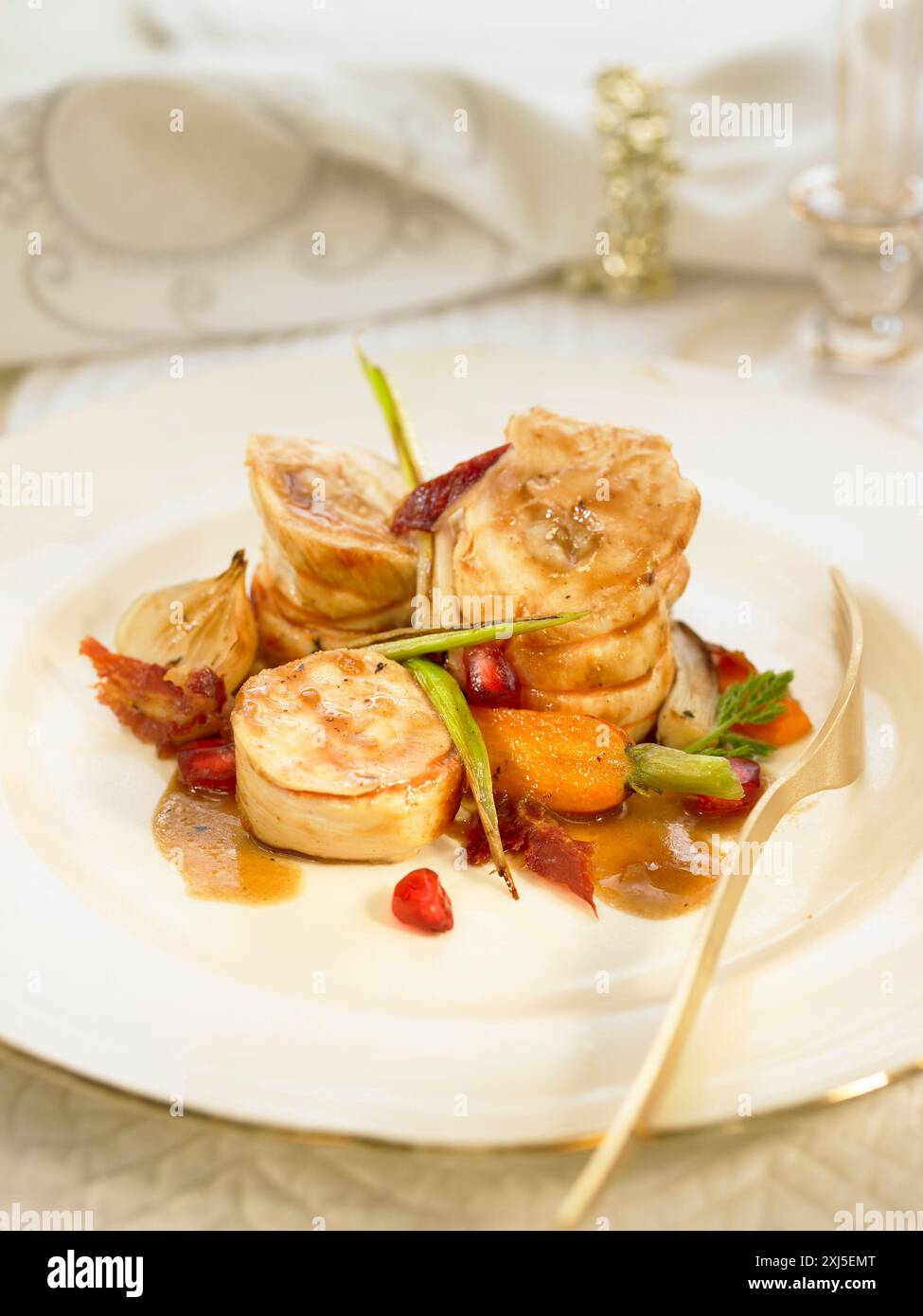 Roast rabbit with spring vegetables Stock Photo - Alamy