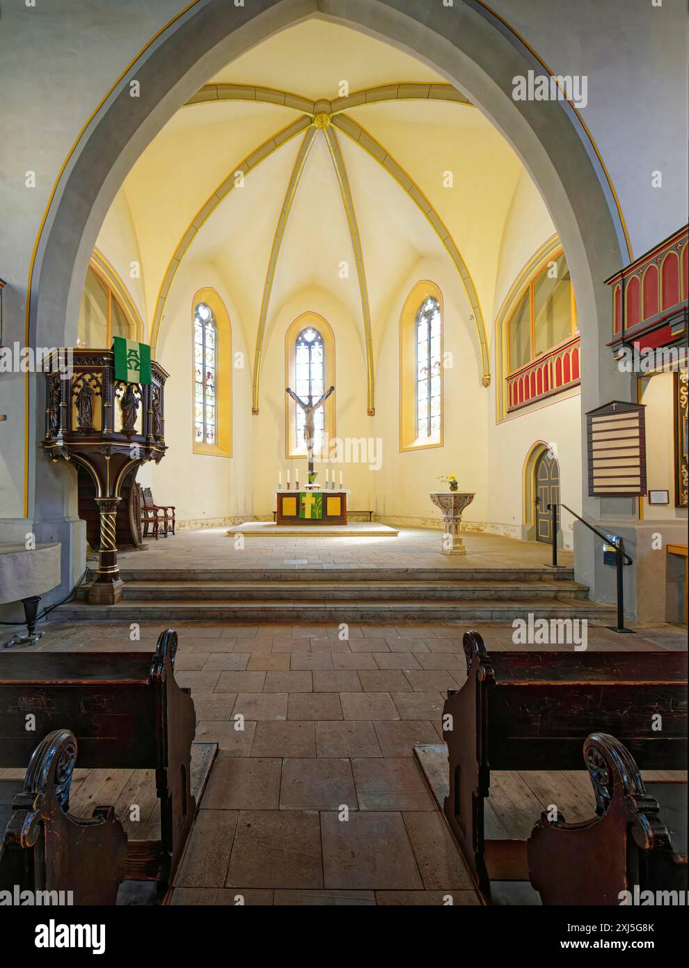 Pulpit, altar, crucifix and baptismal font, late Gothic Protestant ...