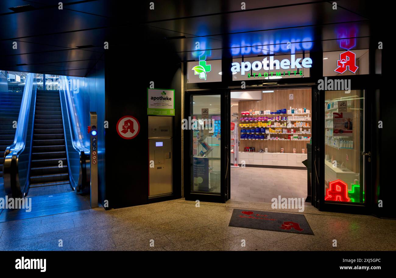 Night shot, pharmacy city centre, logo, subway, escalator, neon light ...