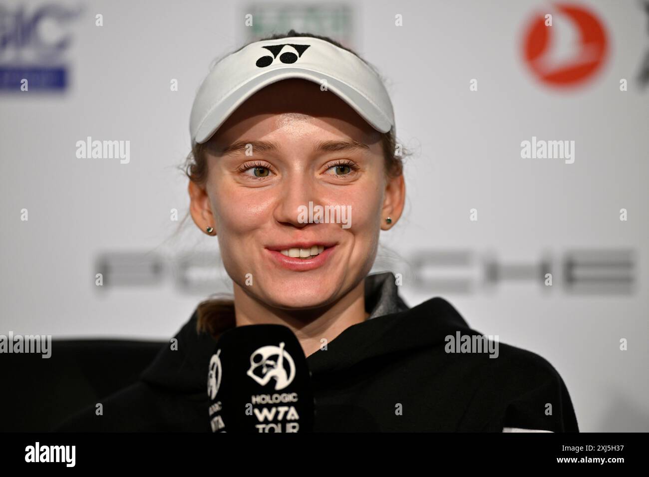 Elena Rybakina (KAZ) portrait, smiles, press conference, PK, interview, microphone, mike, logo ...
