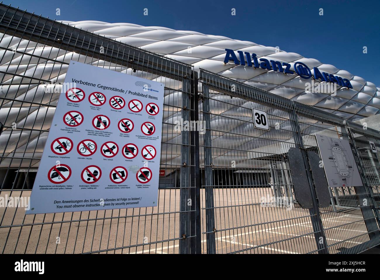 Exterior view Allianz Arena, board, sign, prohibited objects, fence ...