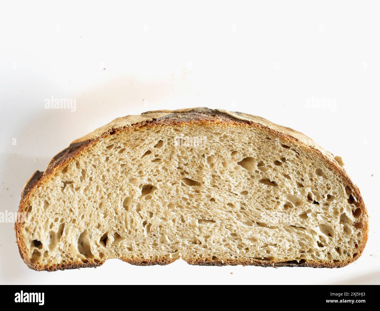 Farmhouse loaf of bread cut in half Stock Photo - Alamy