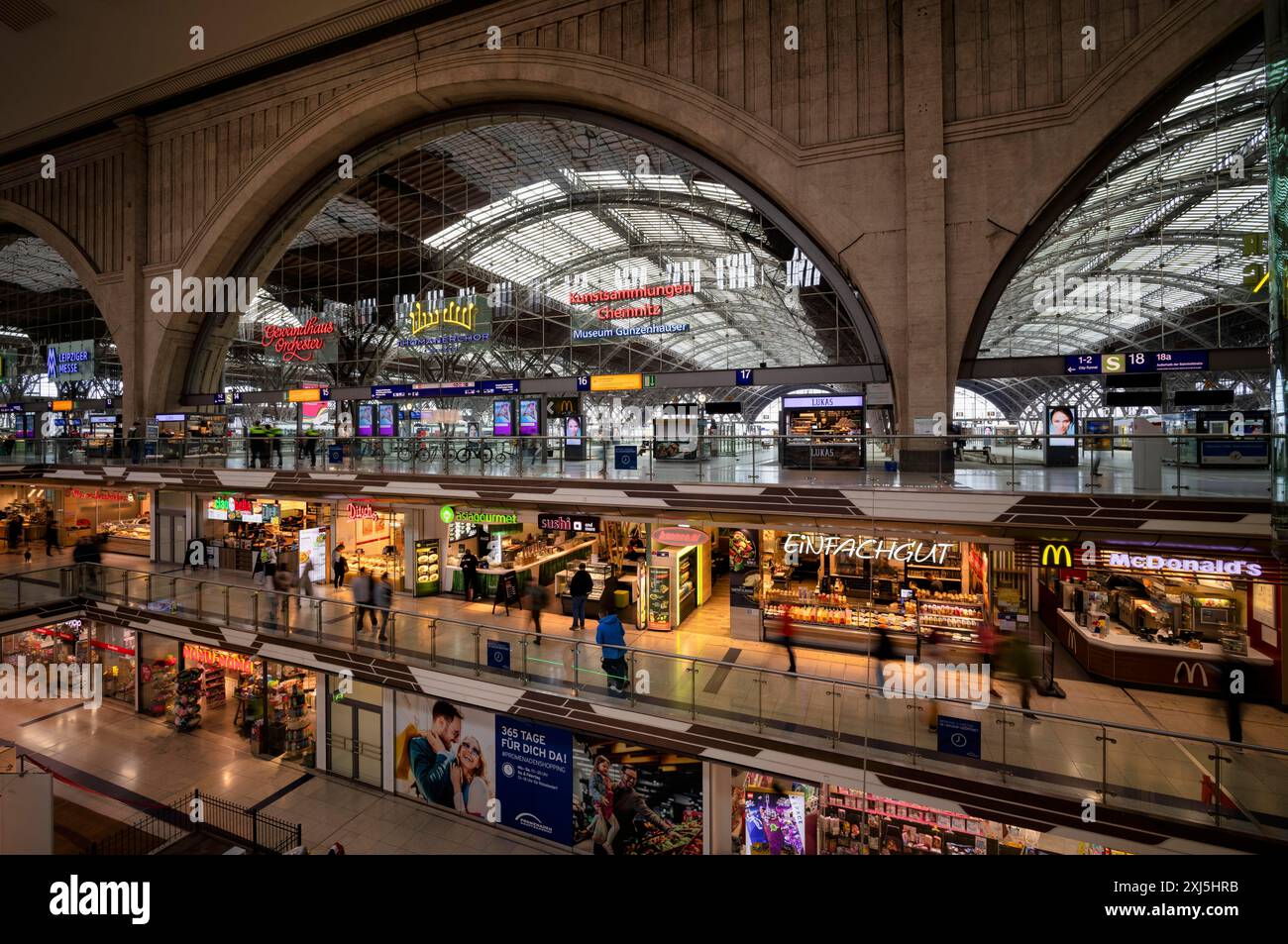 Promenades, shops, retail, station building, logo, passers-by ...