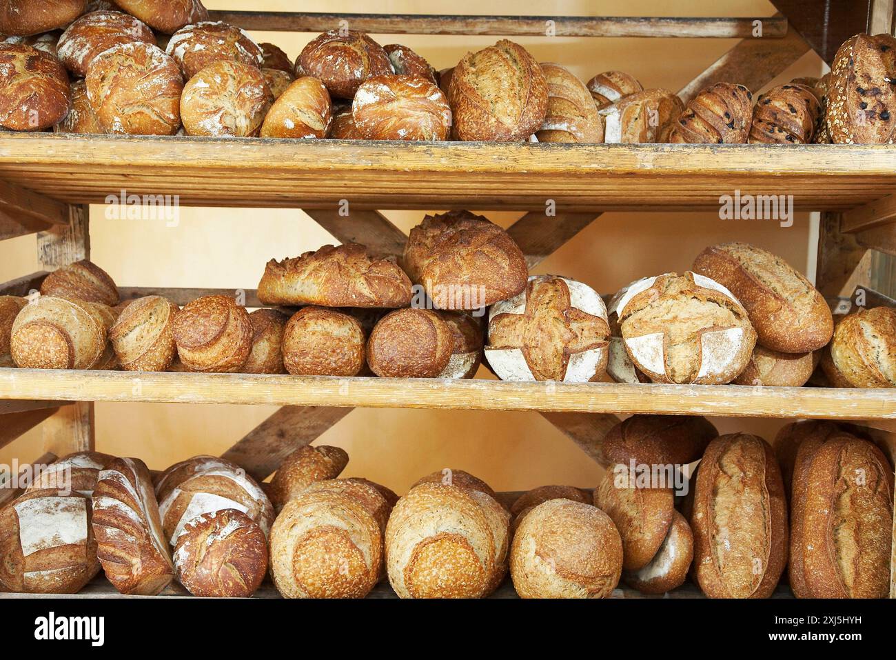 Bread loaves on shelves Stock Photo - Alamy