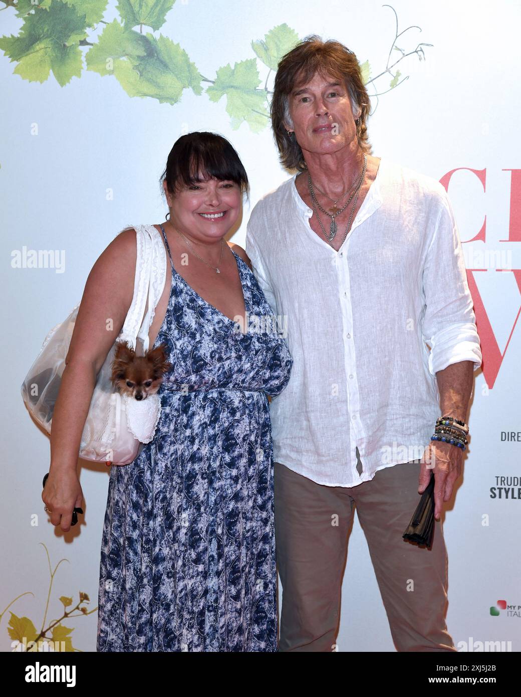 Milan - Photocall film “Celebrity wines” - Ron Moss with his wife ...