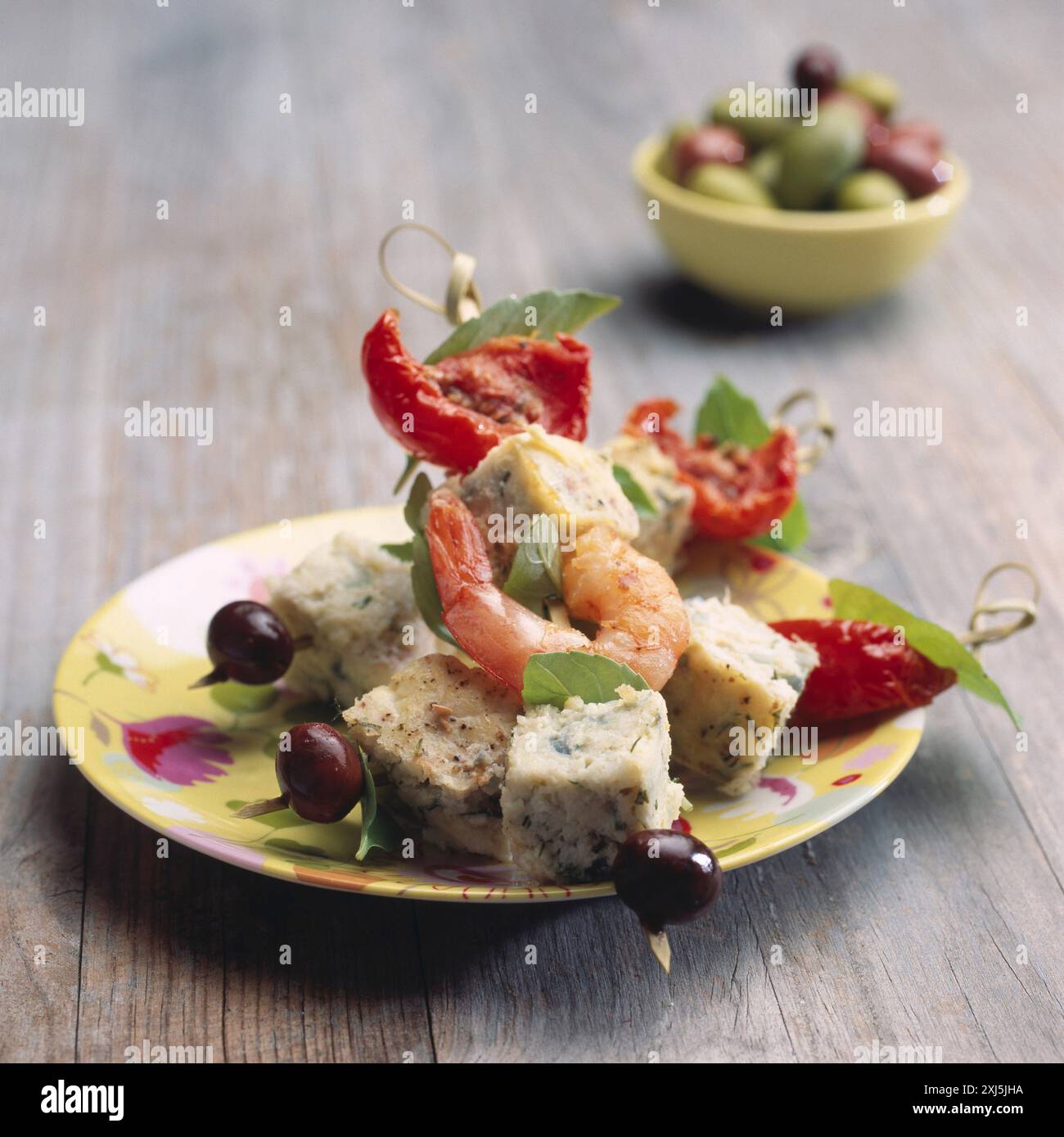 Fish terrine and shrimp brochettes Stock Photo - Alamy