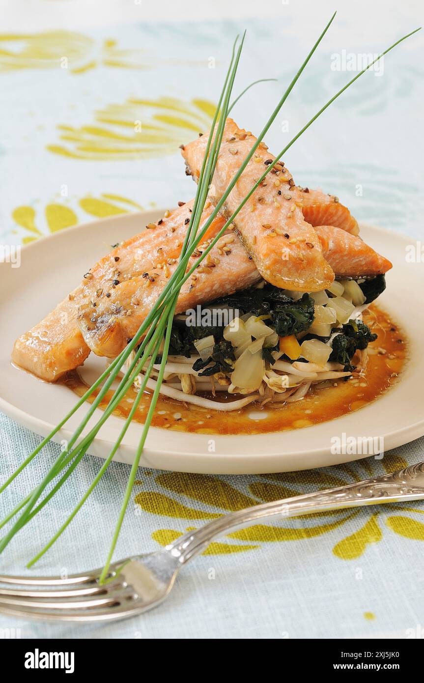 Pink trout fillets with watercress,fennel and soya Stock Photo - Alamy