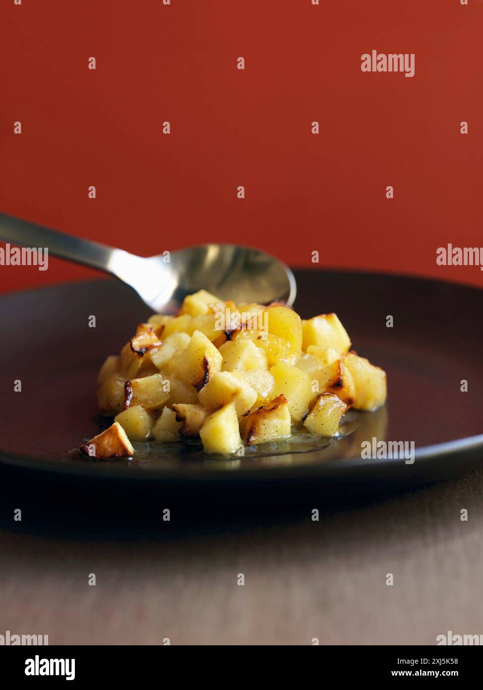Roast diced apples Stock Photo - Alamy