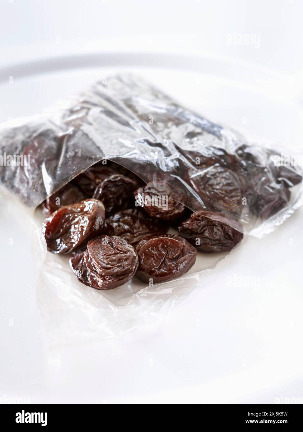 Bag of prunes Stock Photo - Alamy