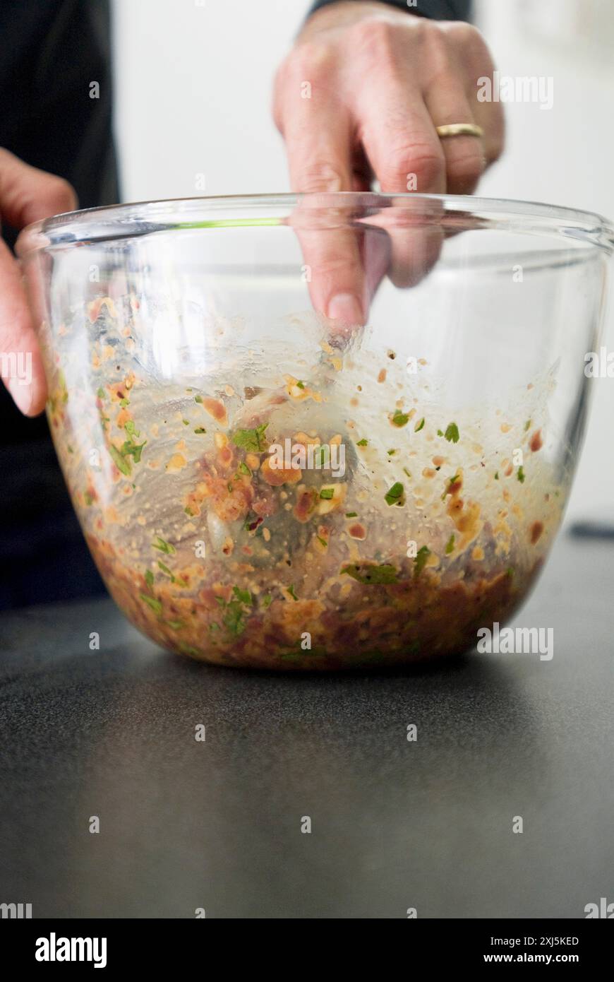 Mixing together the ingredients Stock Photo - Alamy